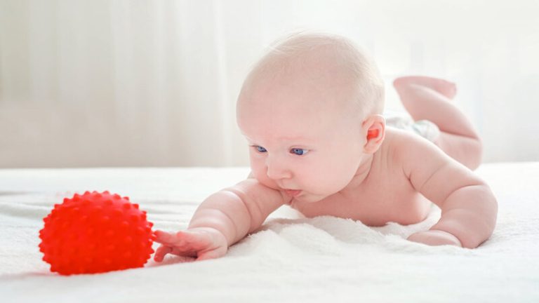 When Do Babies Start Reaching For Objects? - Being The Parent