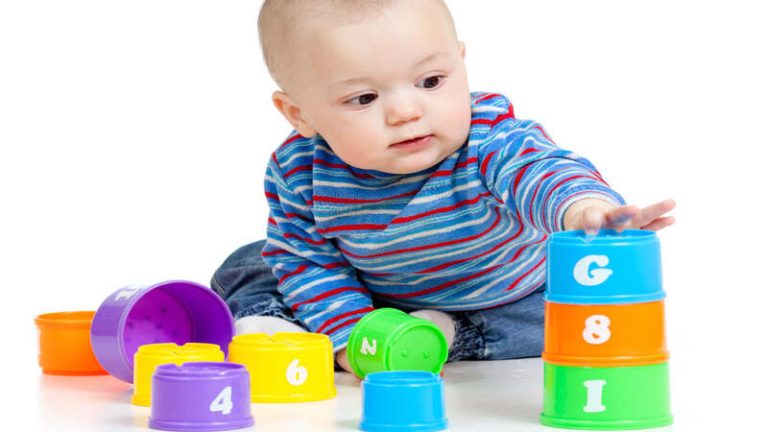 When Do Babies Start Reaching For Objects? - Being The Parent