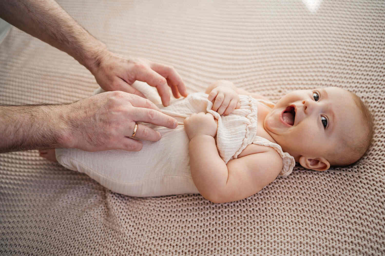 Tickling Babies - When Can You Start and When to Avoid - Being The Parent